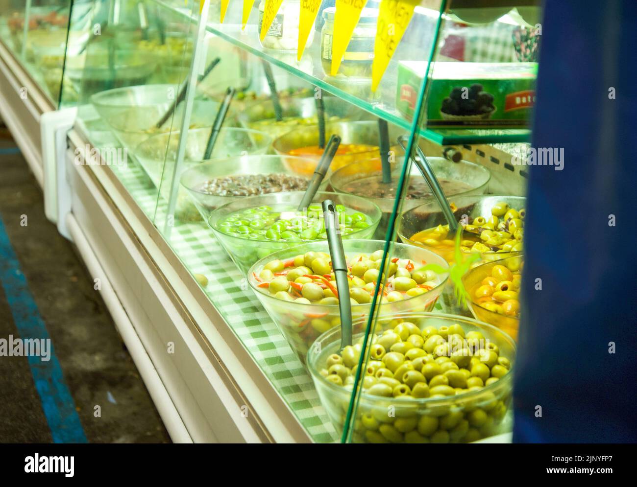 Olives for sale from chilled unit on a Mediterranean food stall in ...