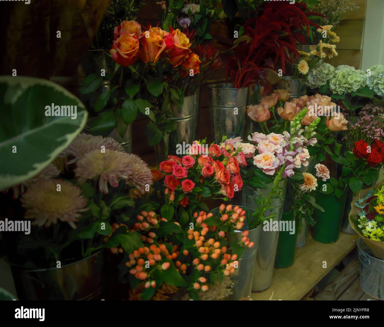 Florists stall with pots of bouquets and individual flowers, UK Stock ...