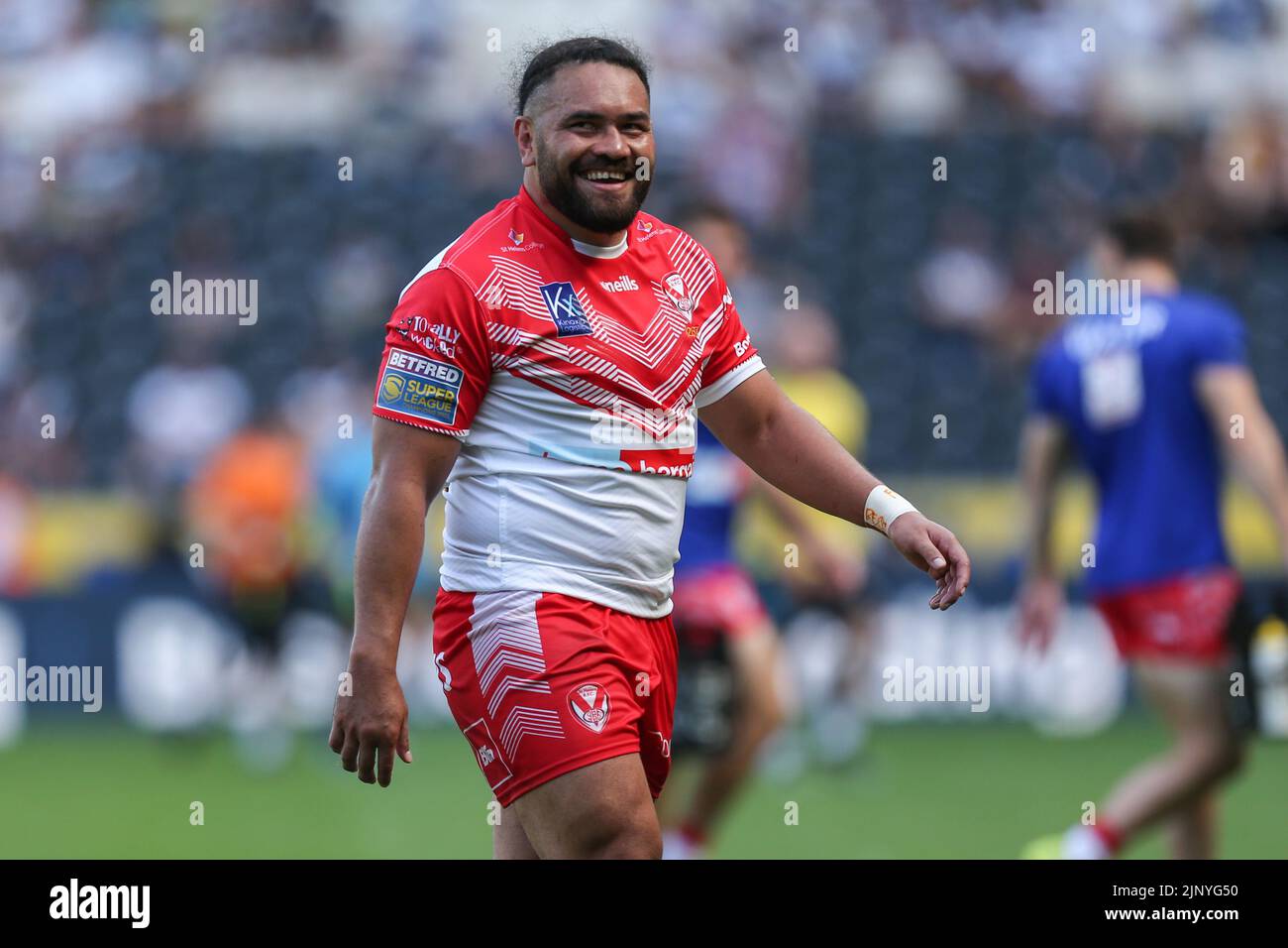 Konrad Hurrell #23 of St Helens smiles at fans as they chant his name ...