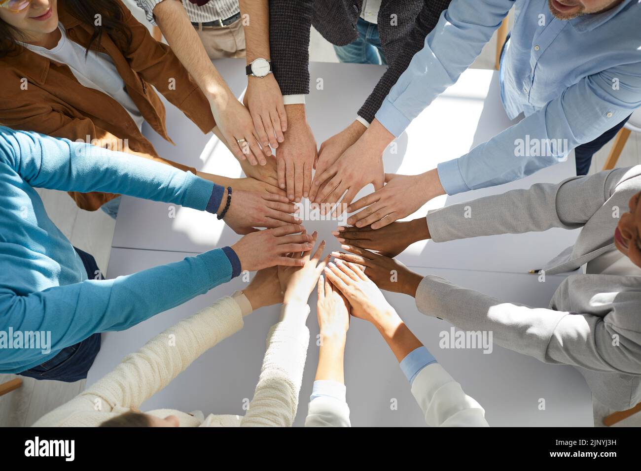 Team building trust teamwork unity hi-res stock photography and images ...