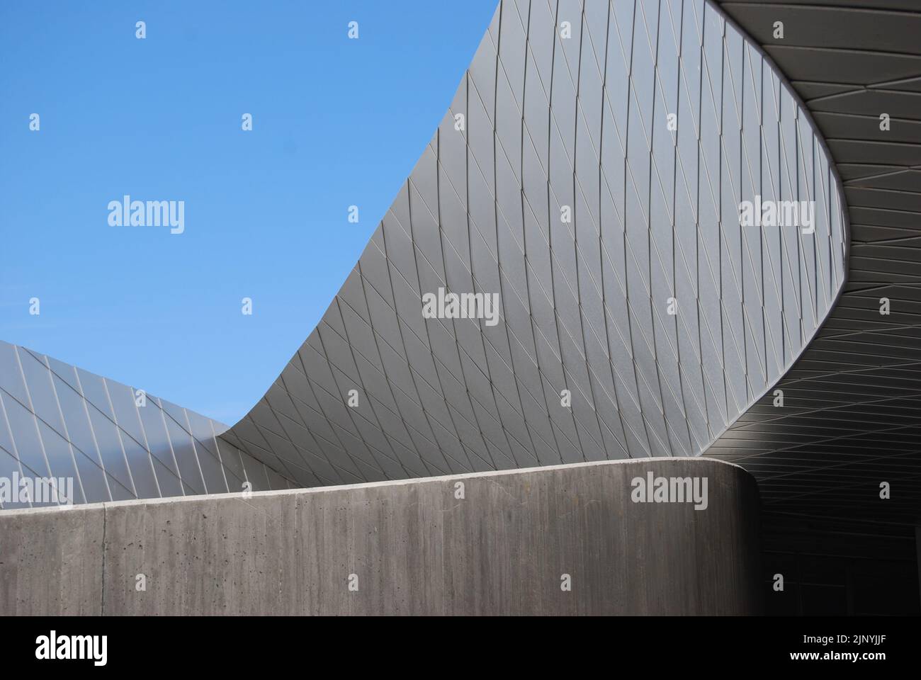 The aluminium shingle clad curved architecture of Denmark's National ...