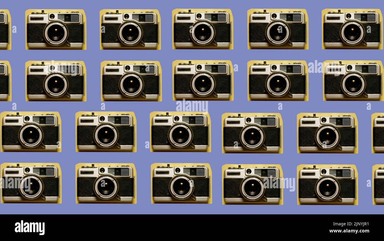 Pattern collage of retro styled analog cameras isolated on blue ...