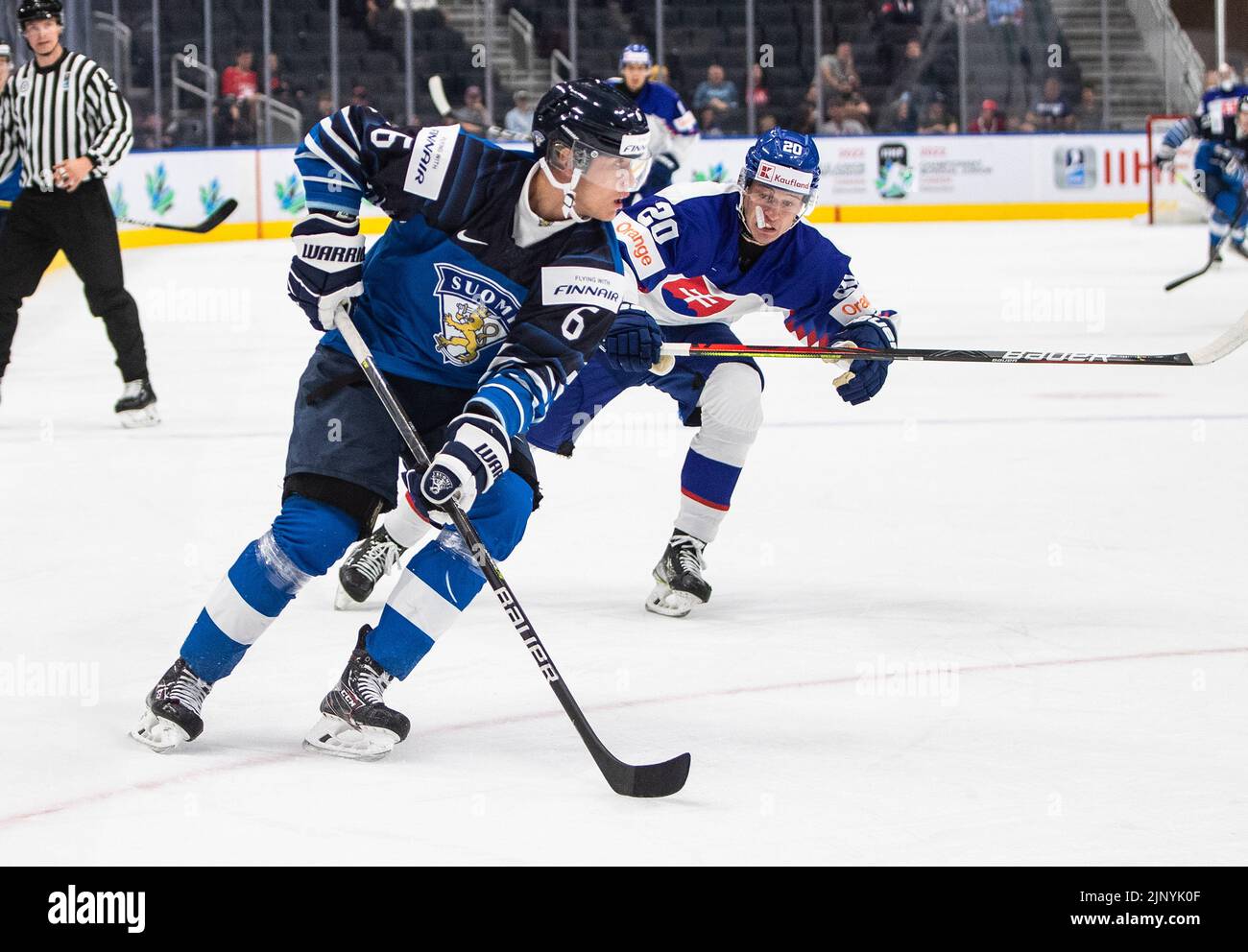 Finland's Eemil Viro (6) is chased by Slovakia's Libor Nemec (20 ...