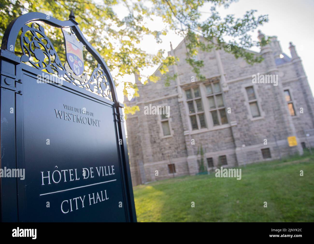 A bilingual sign for City Hall is shown in the city of Westmount on the ...