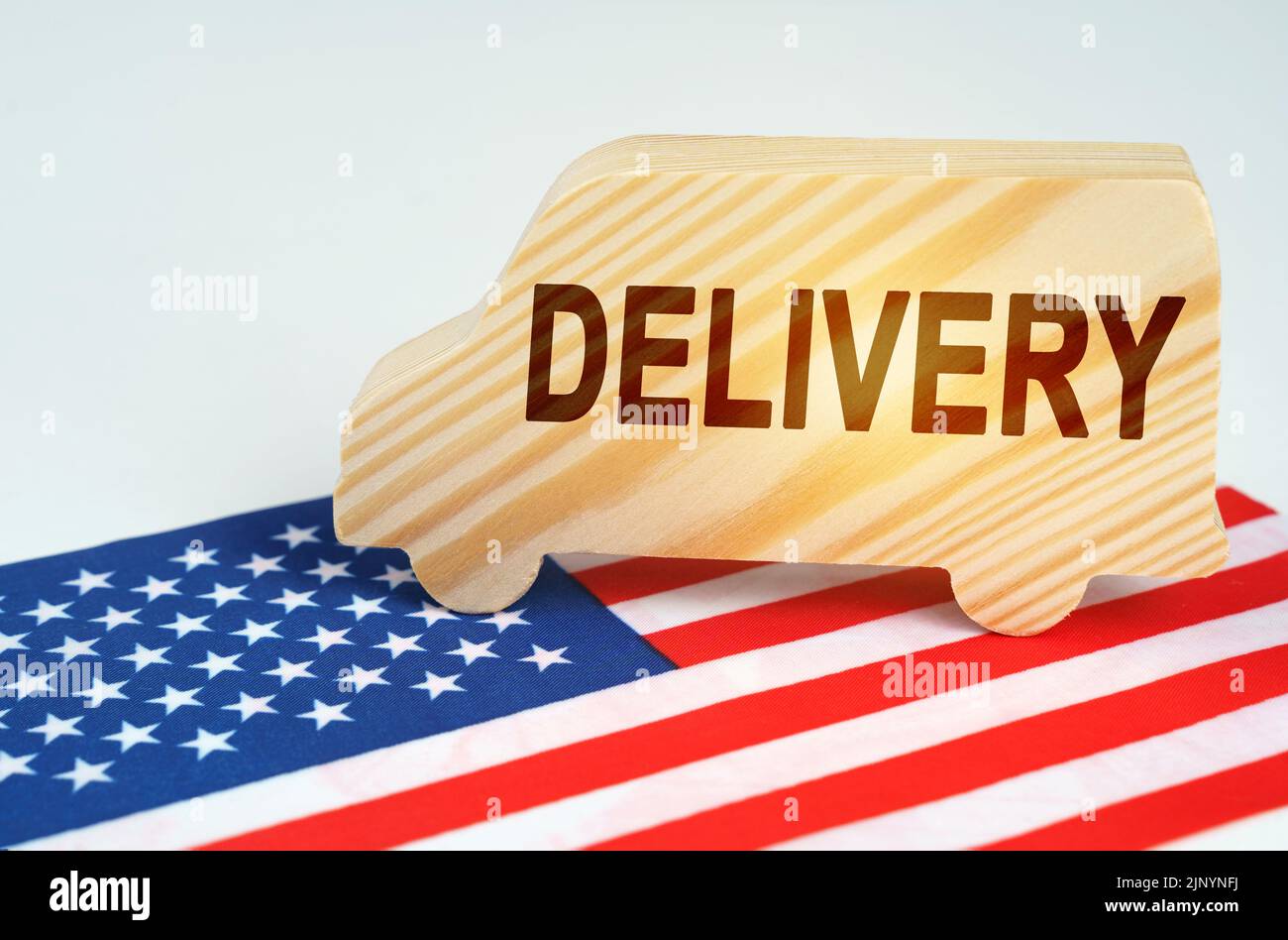 The concept of cargo transportation and logistics. On the US flag is a ...