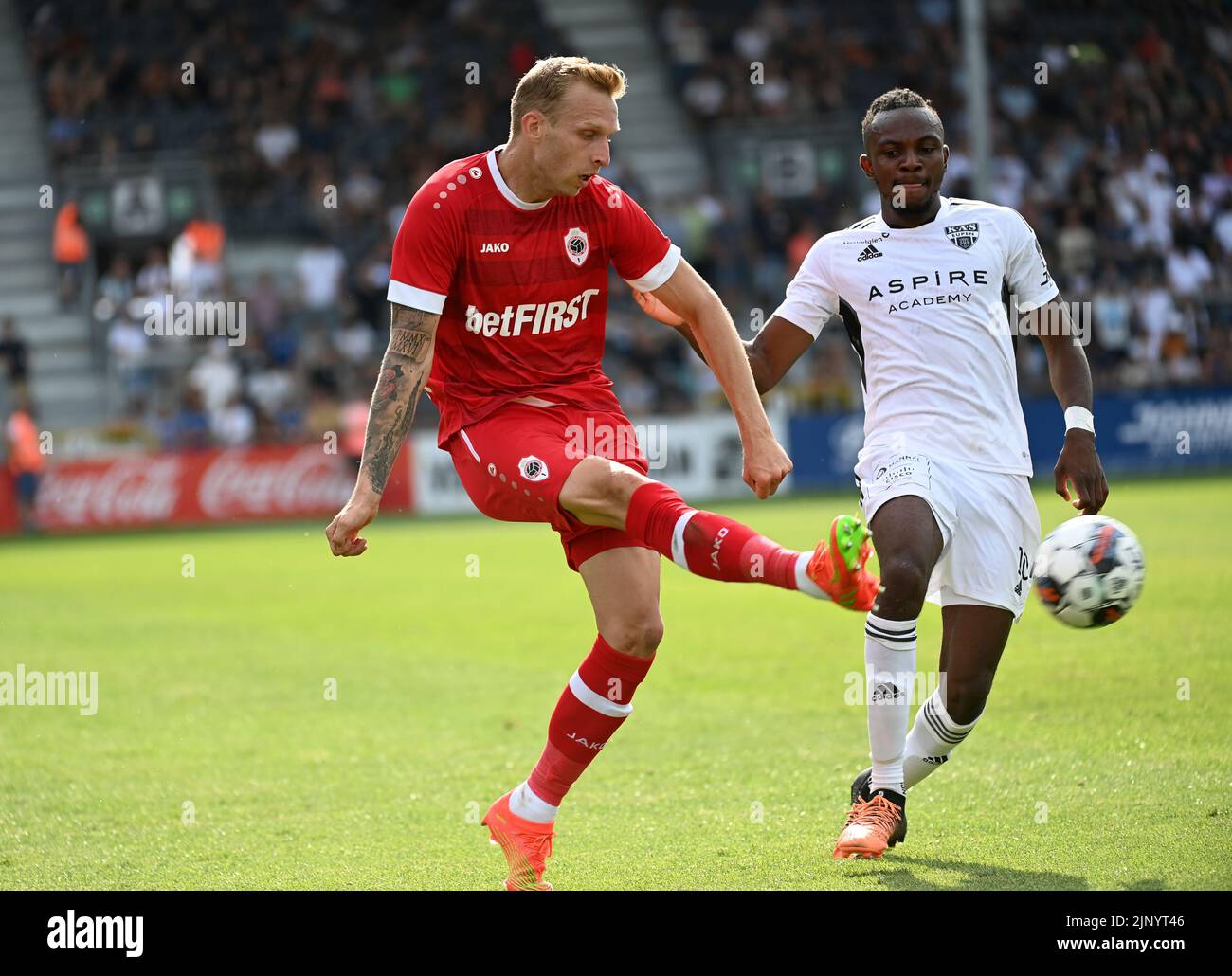 Antwerp's Ritchie De Laet fights for the ball during a soccer match ...