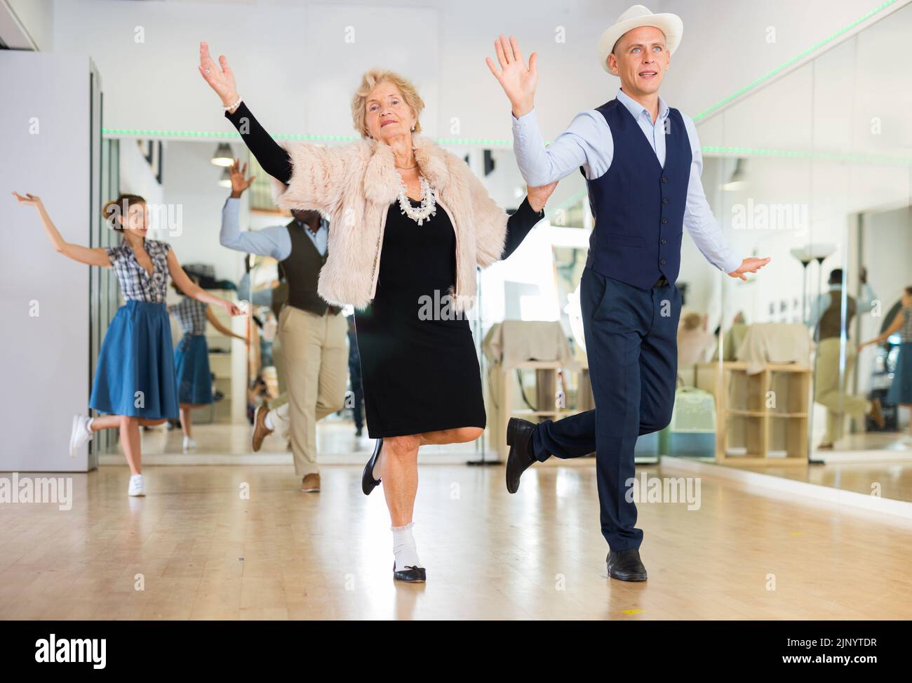 Mature woman dancing swing hi-res stock photography and images - Alamy