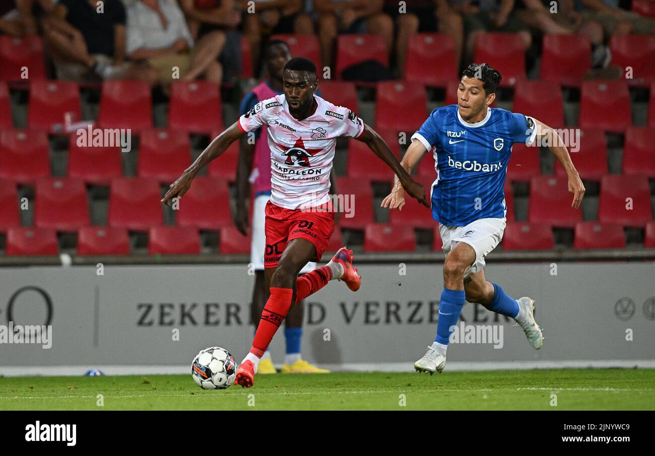 Essevee's Alieu Fadera and Genk's Gerardo Arteaga pictured in action ...
