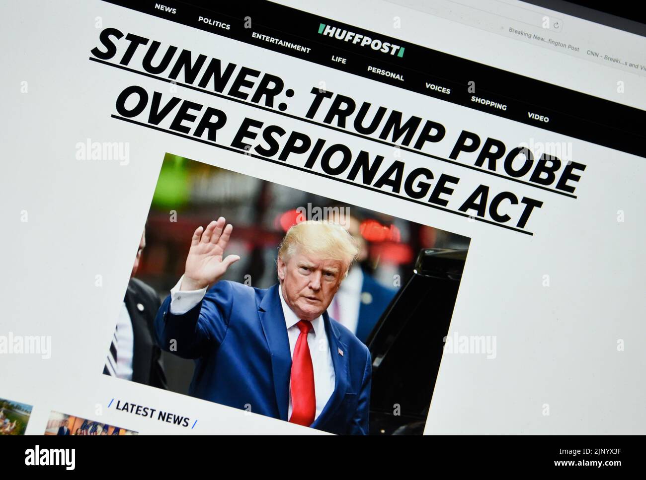A computer screenshot of Huffpost coverage of the FBI search of Donald ...