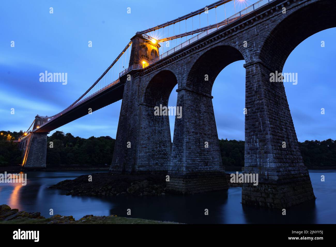 An evening photo of Menai Bridge, North Wales, UK in July 2021 Stock ...