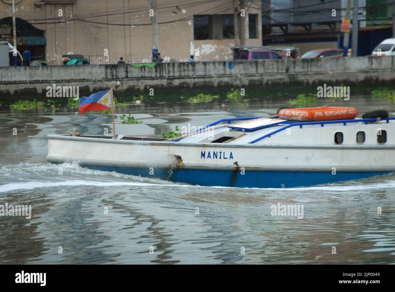 Boat crossing Pasig River, Manila, Philippines Stock Photo - Alamy