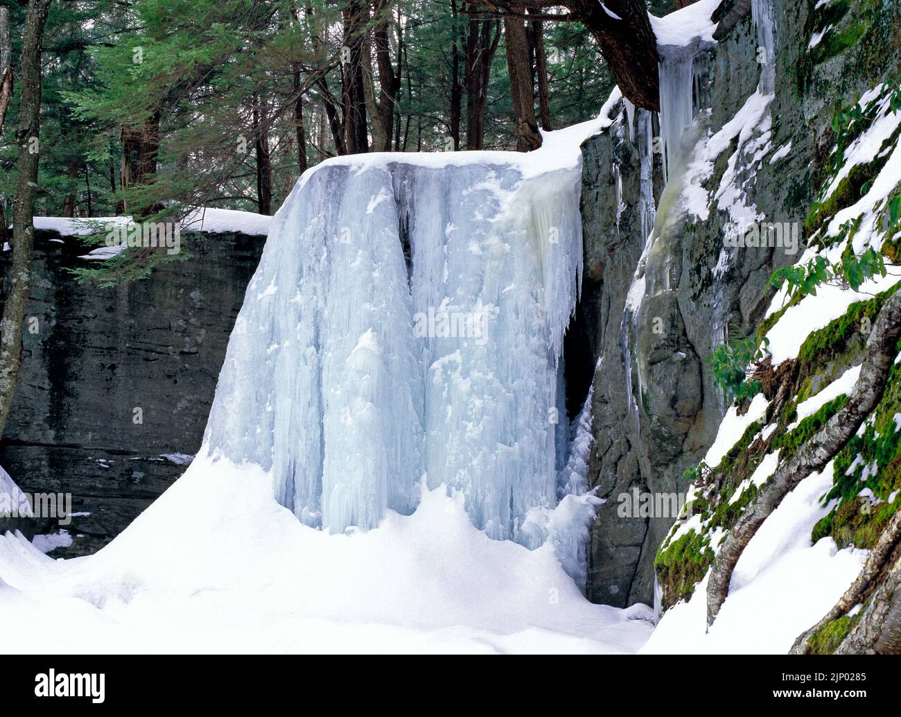 22-foot high Hector Falls flows over massive sandstone boulders in ...