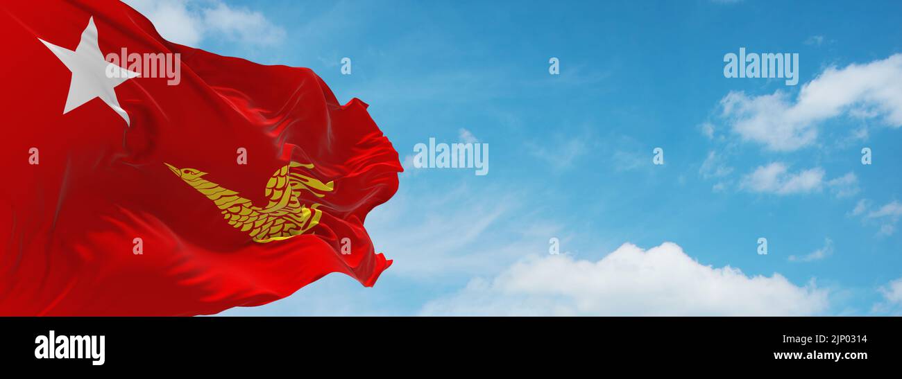 flag of Austroasiatic peoples Mon people at cloudy sky background ...