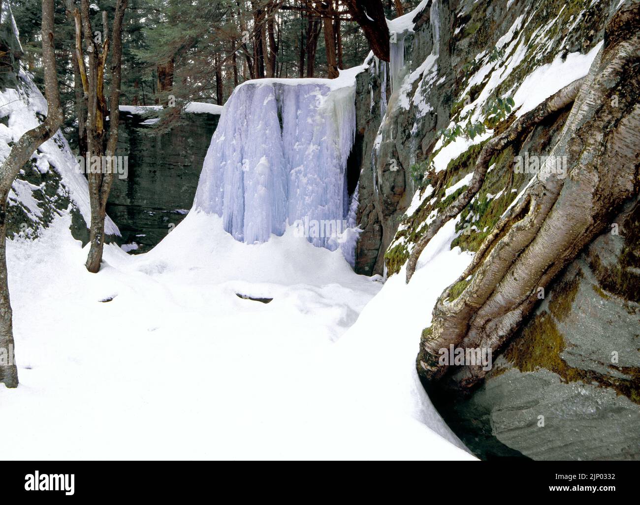 22-foot high Hector Falls flows over massive sandstone boulders in ...