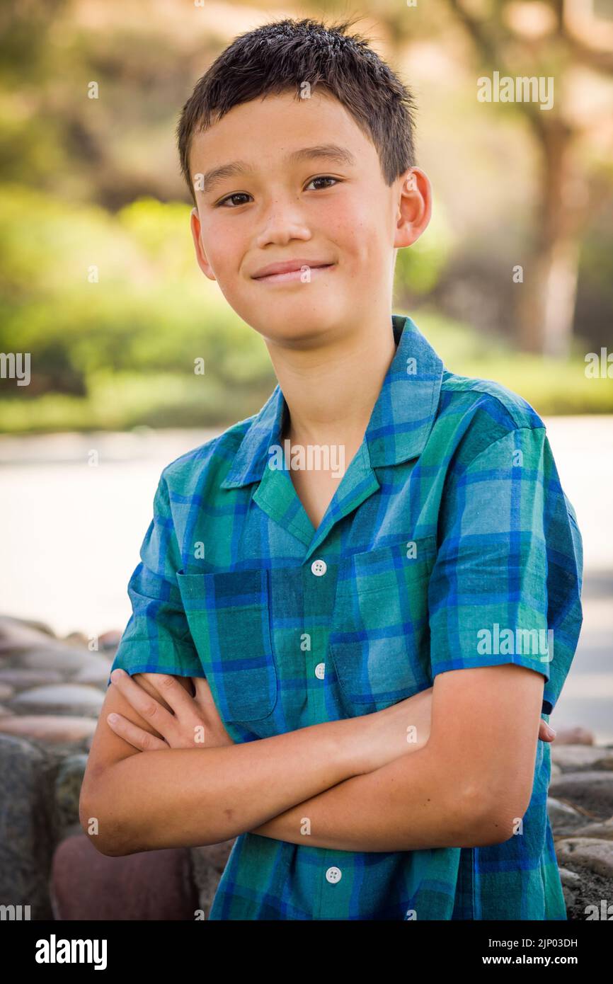 Outdoor portrait of a mixed race Chinese and Caucasian boy Stock Photo ...