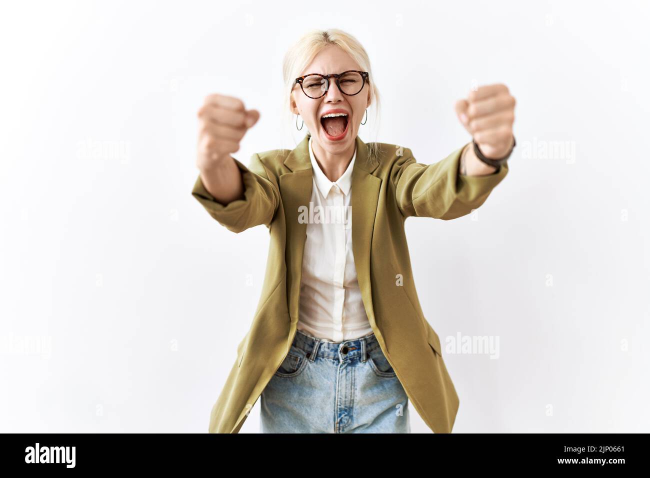 Beautiful caucasian business woman standing over isolated background ...