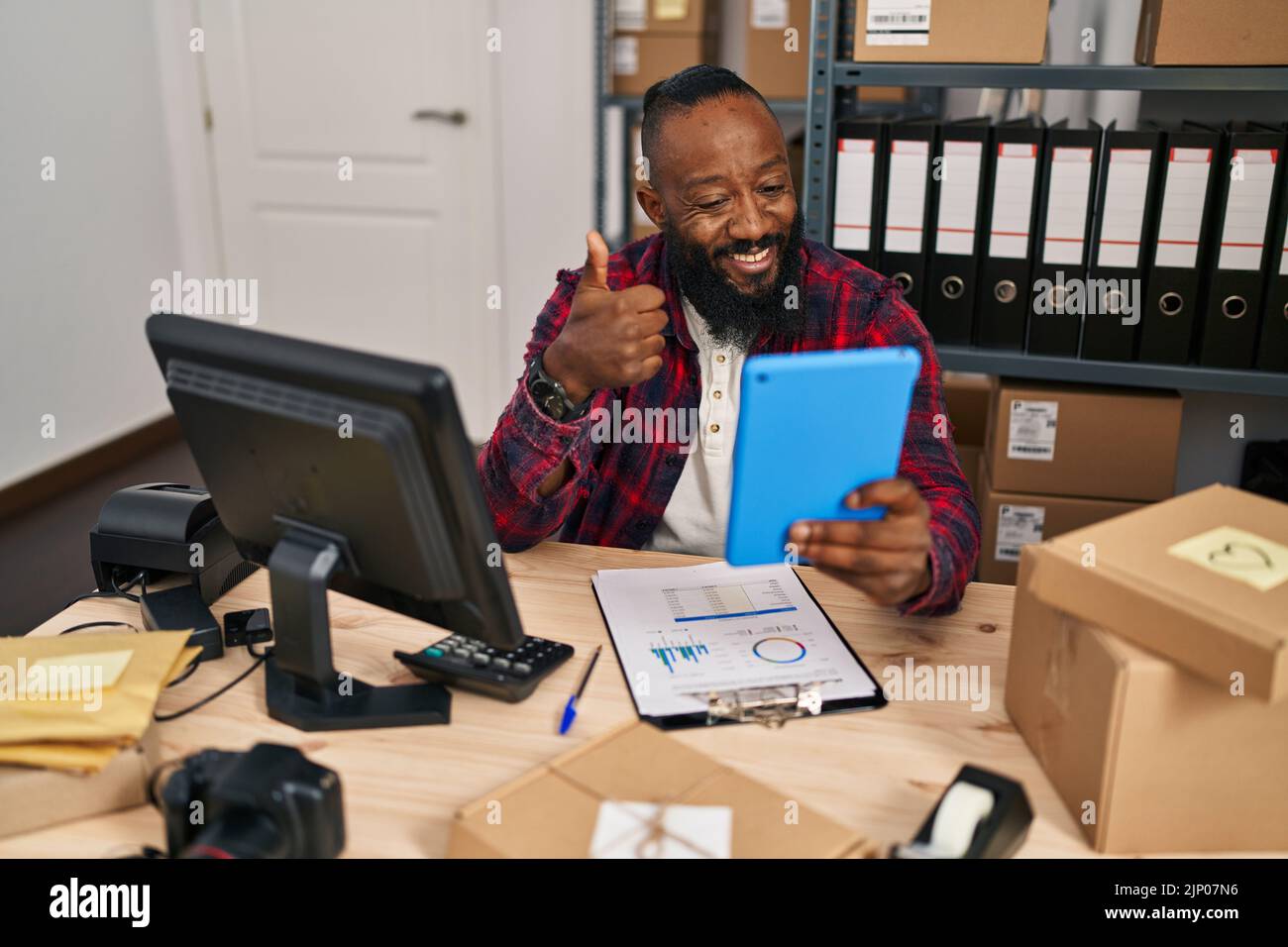 African american man working at small business ecommerce doing video ...