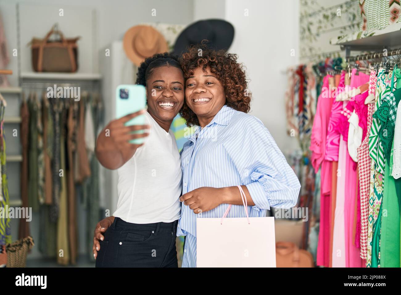 African american women customers make selfie by smartphone shopping at ...