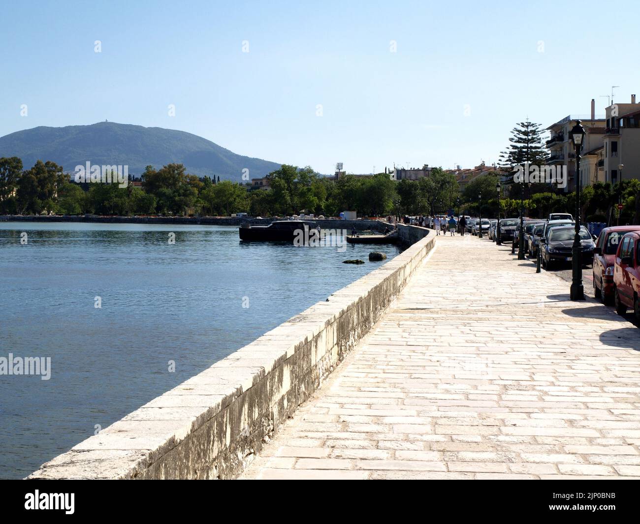 Sunny spring day at Garitsa Bay, Corfu, Greece Stock Photo - Alamy