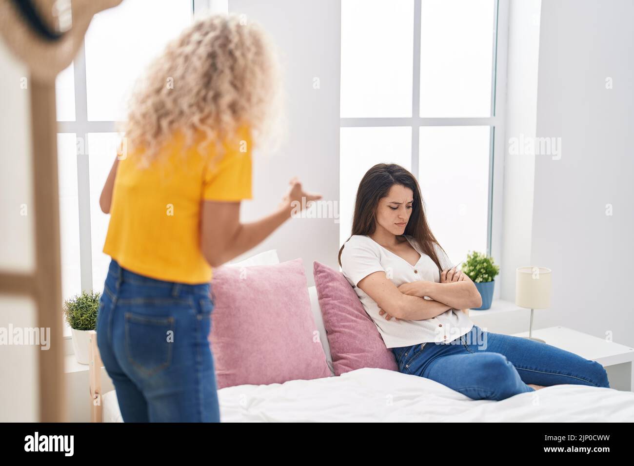 Two women mother and daughter arguing at bedroom Stock Photo - Alamy
