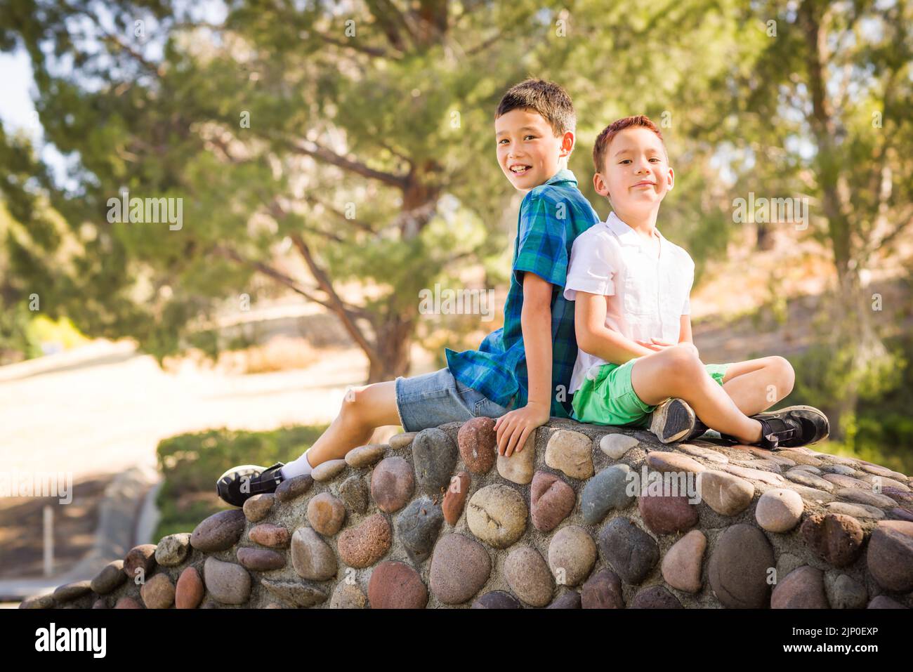 Outdoor portrait of mixed race Chinese and Caucasian brothers Stock ...
