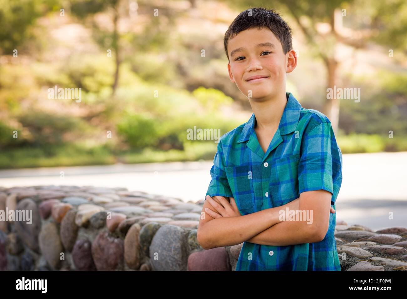 Outdoor portrait of a mixed race Chinese and Caucasian boy Stock Photo ...
