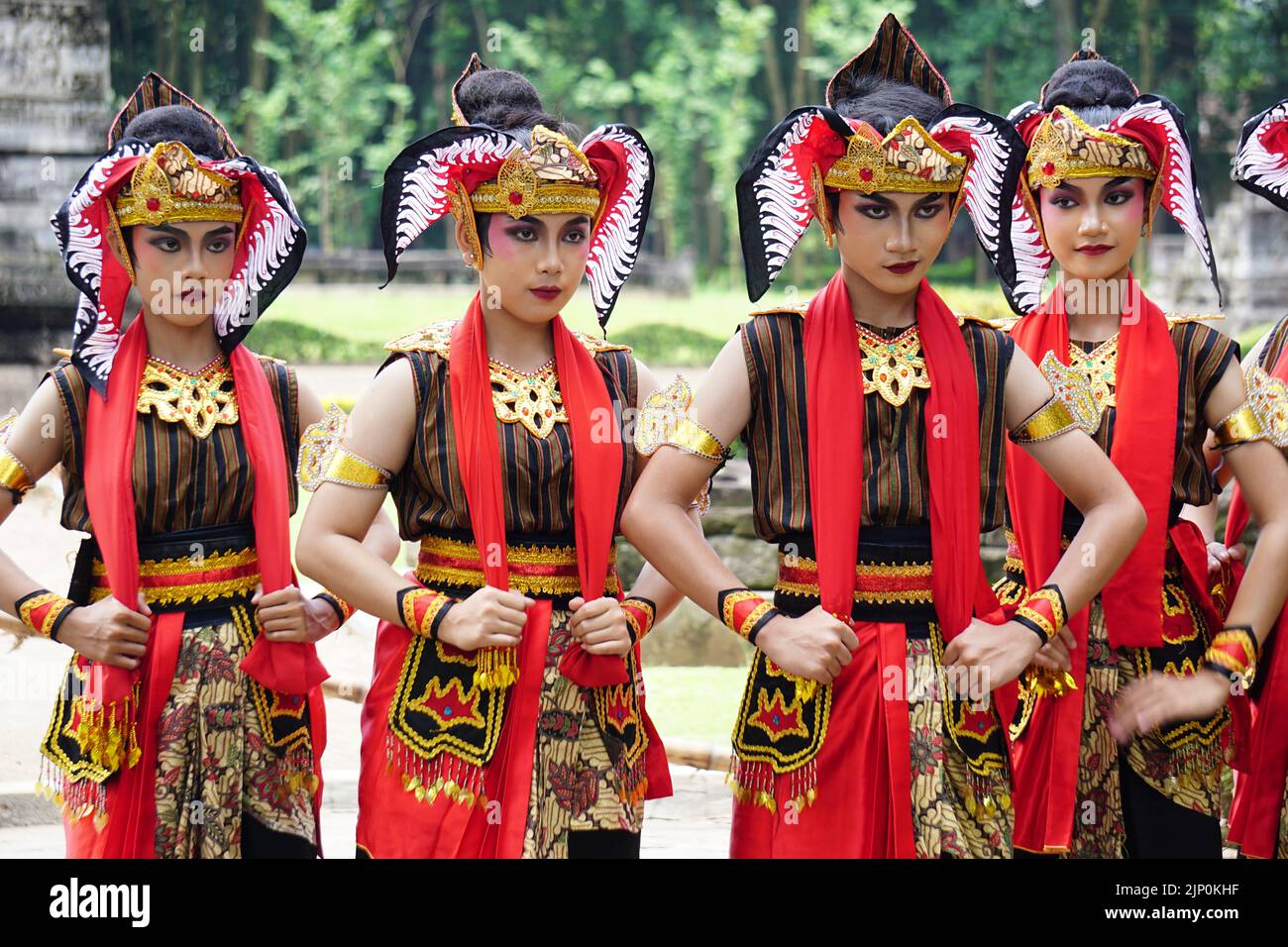 Indonesian dancers with traditional costumes are ready to perform to ...
