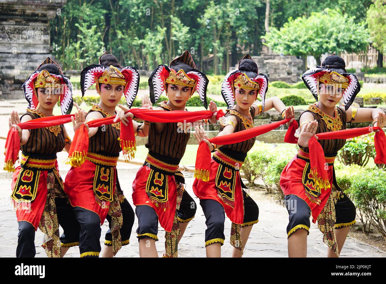 Indonesian dancers with traditional costumes are ready to perform to ...