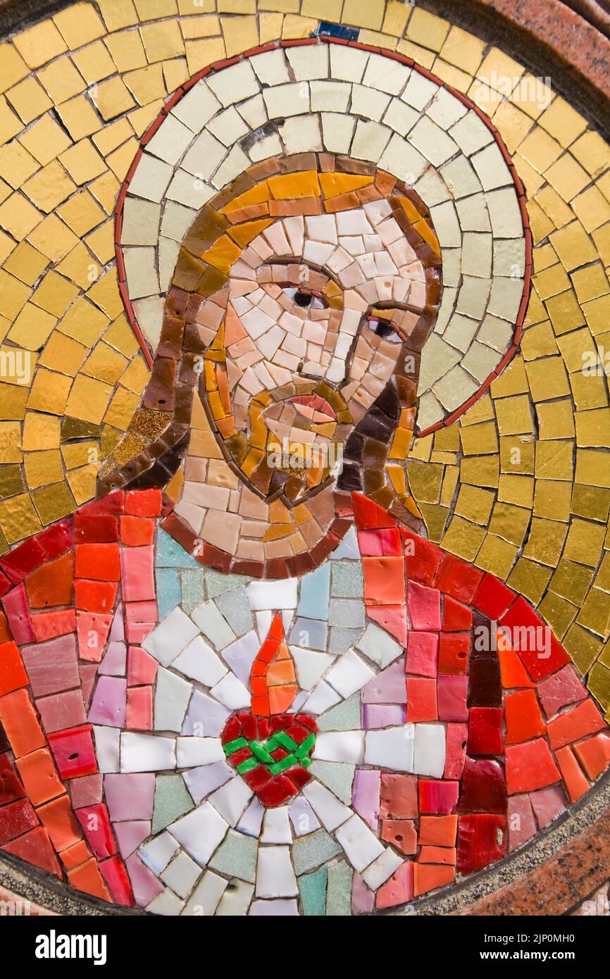 Religious Mosaic of Jesus on memorial monument in cemetery Stock Photo ...