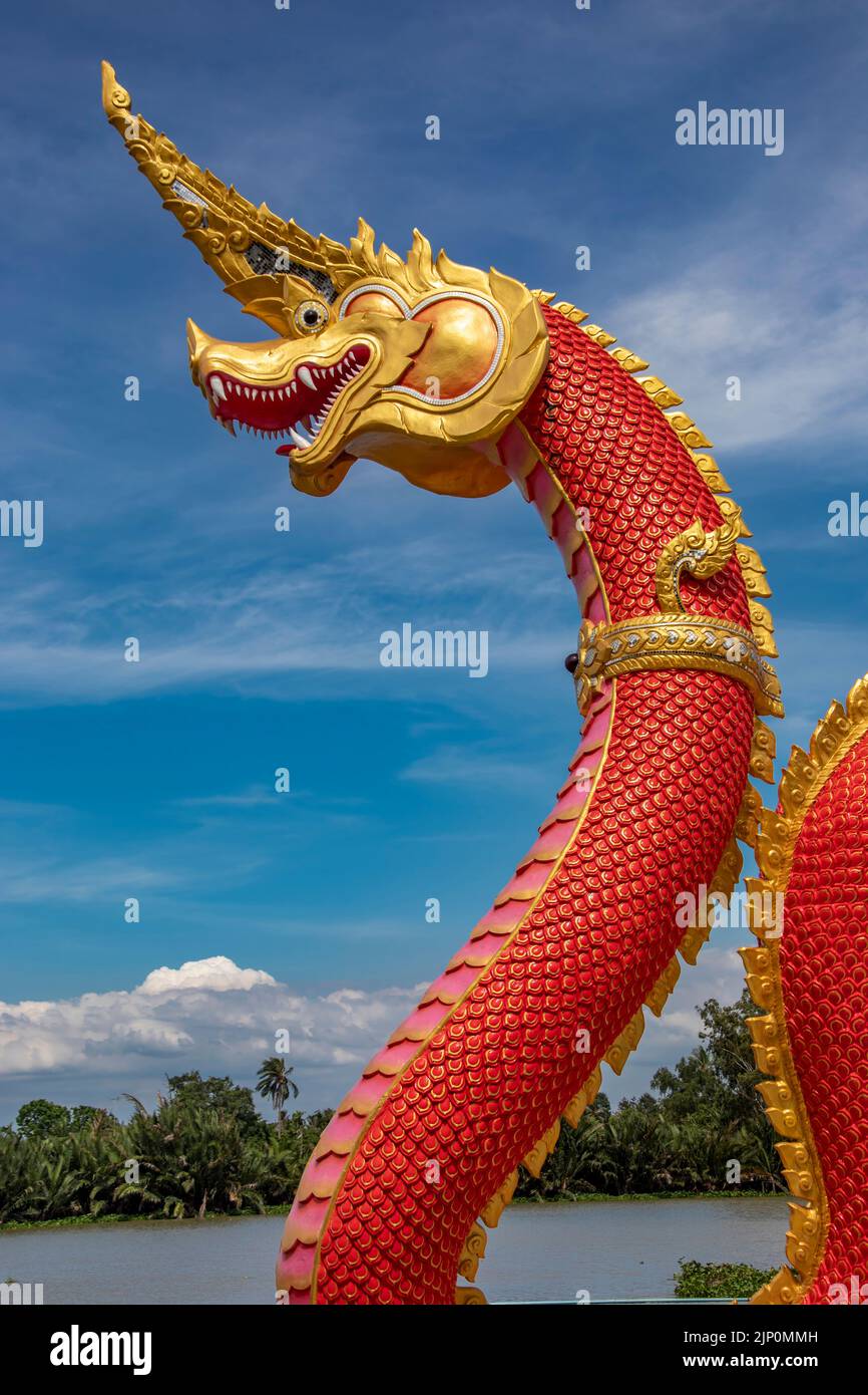 the gigantic Phaya Nak statue in Wat Saman Rattanaram in Chachoengsao ...