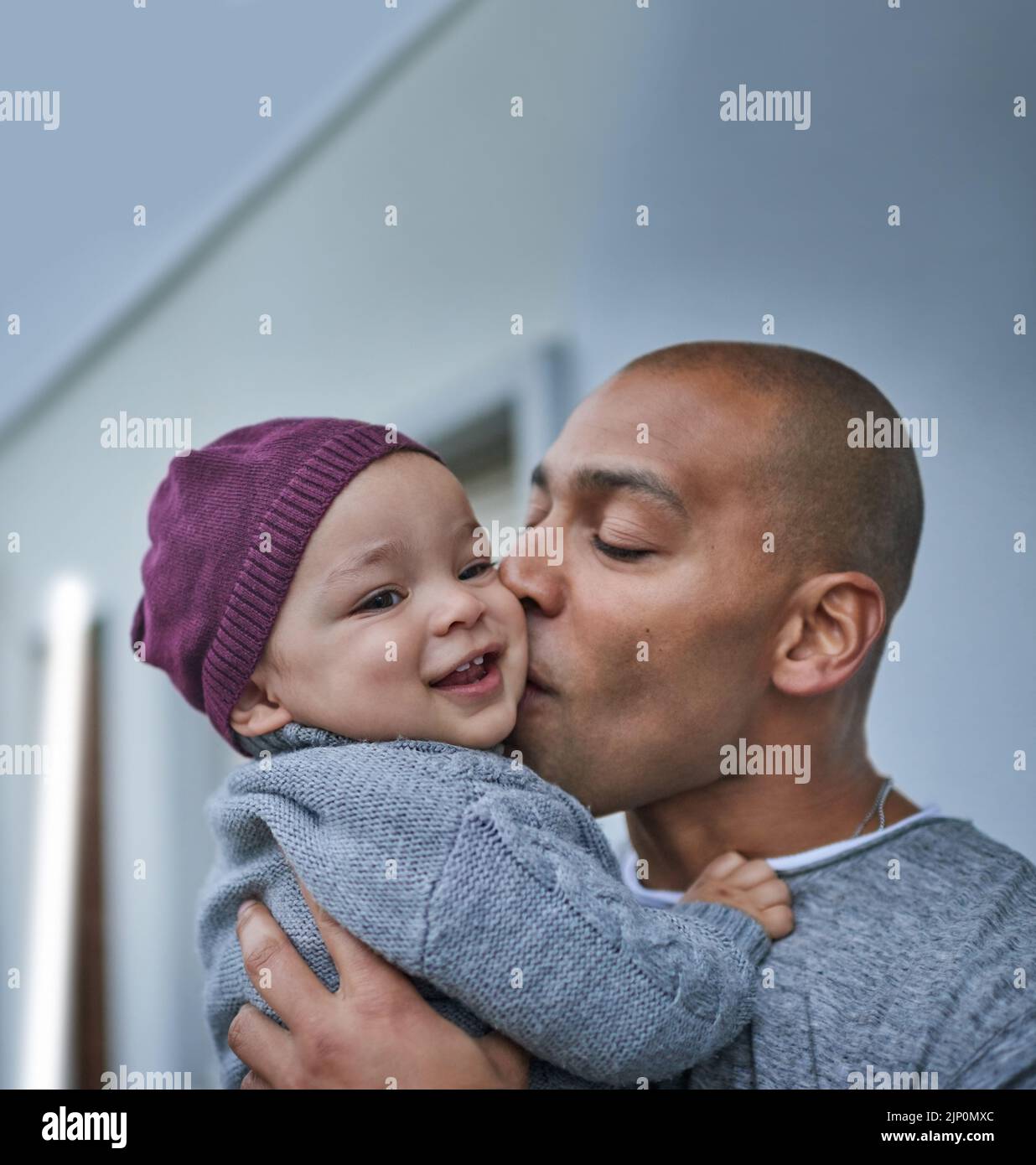 Some much needed bonding. a father bonding with his little son at home ...