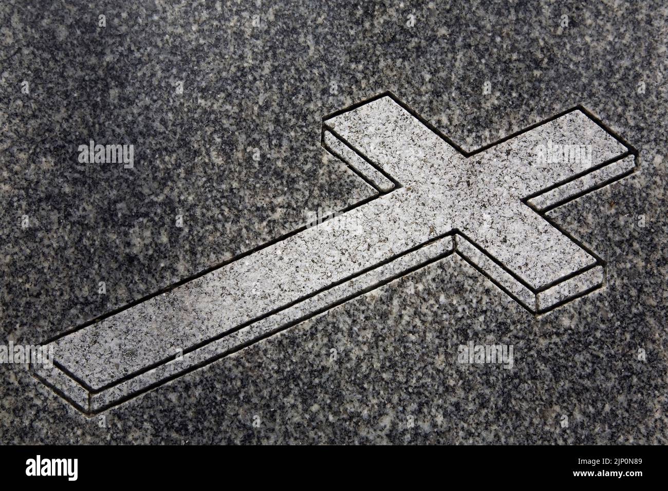 Religious Cross depicted on memorial monument in a cemetery Stock Photo ...