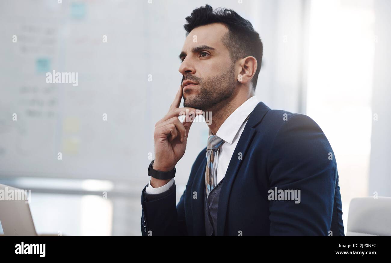 Success comes from following your ambitions. a young businessman ...