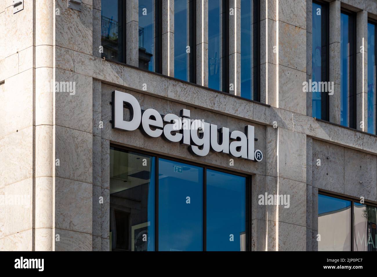 Desigual logo of the Spanish fashion label. Clothing brand sign on a ...