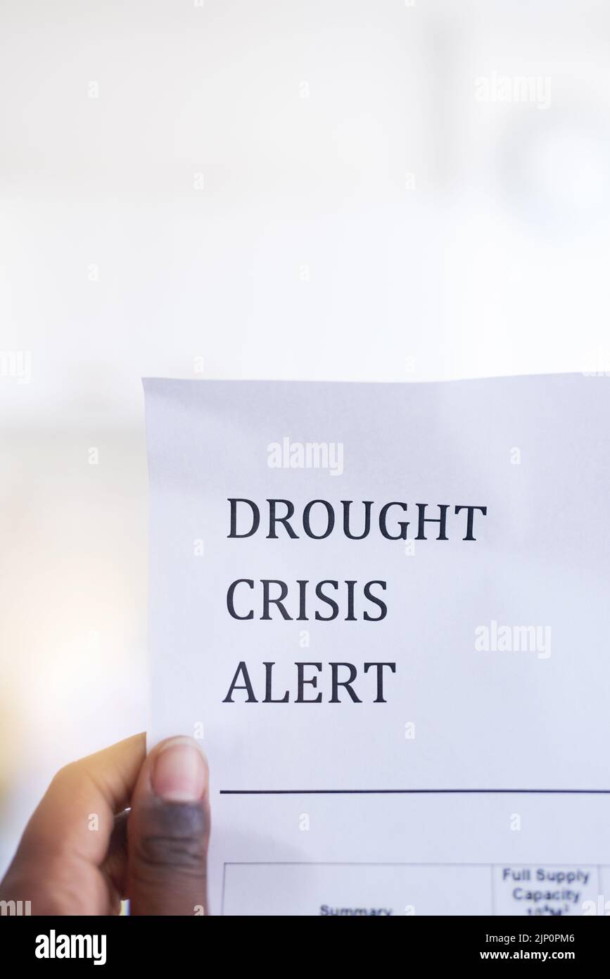 Be aware of the drought. Closeup of an unrecognizable person holding a ...