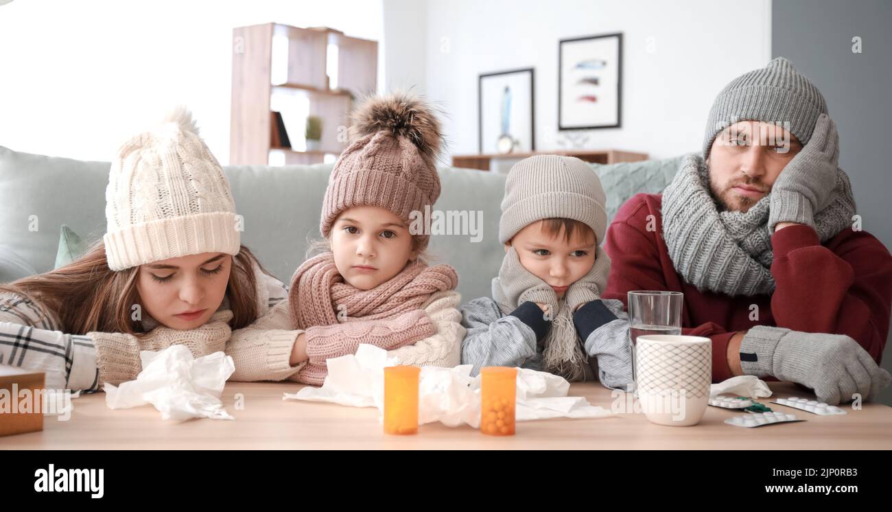 Family ill with flu at home Stock Photo - Alamy