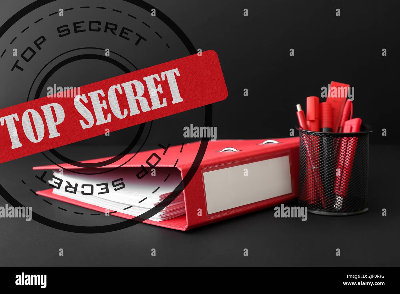 Folder with top secret documents on dark background Stock Photo - Alamy