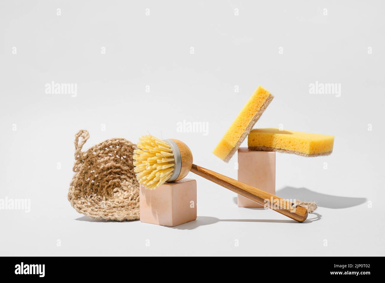 Set of different cleaning supplies on grey background Stock Photo - Alamy