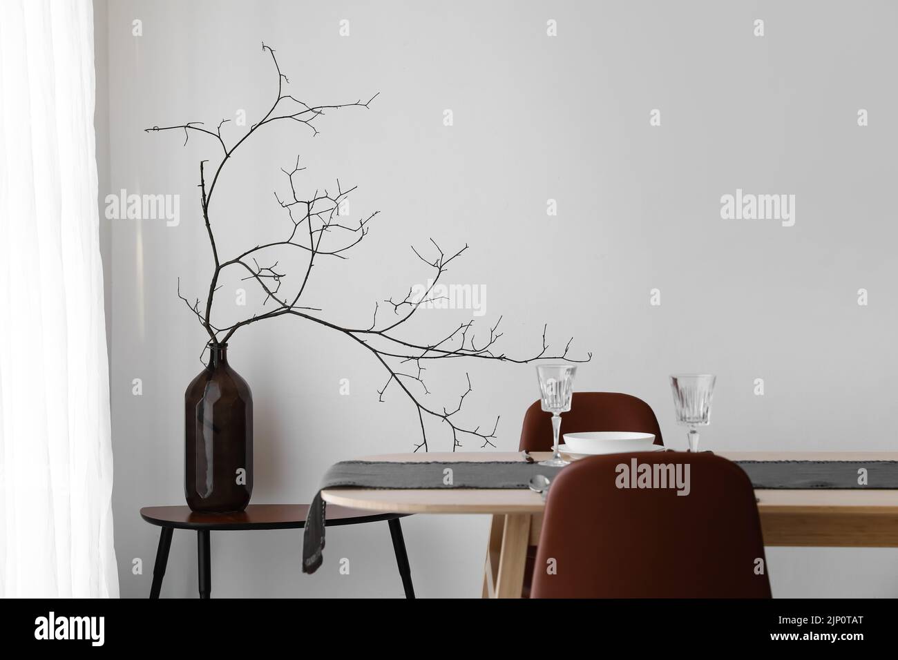 Beautiful table setting in room Stock Photo - Alamy
