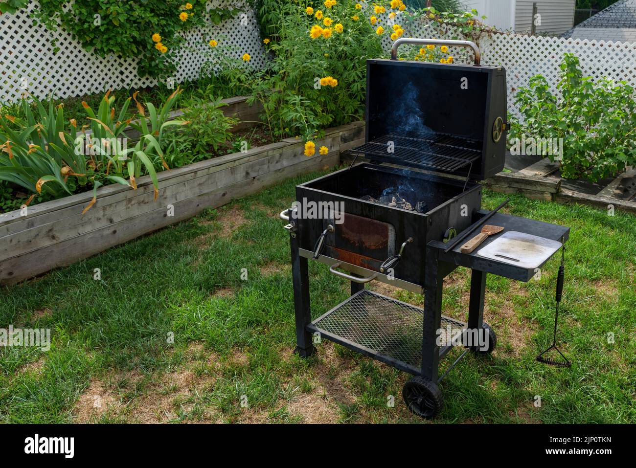 Scene Of Family Barbecue Grill Party Or Picnic On The Lawn In The ...
