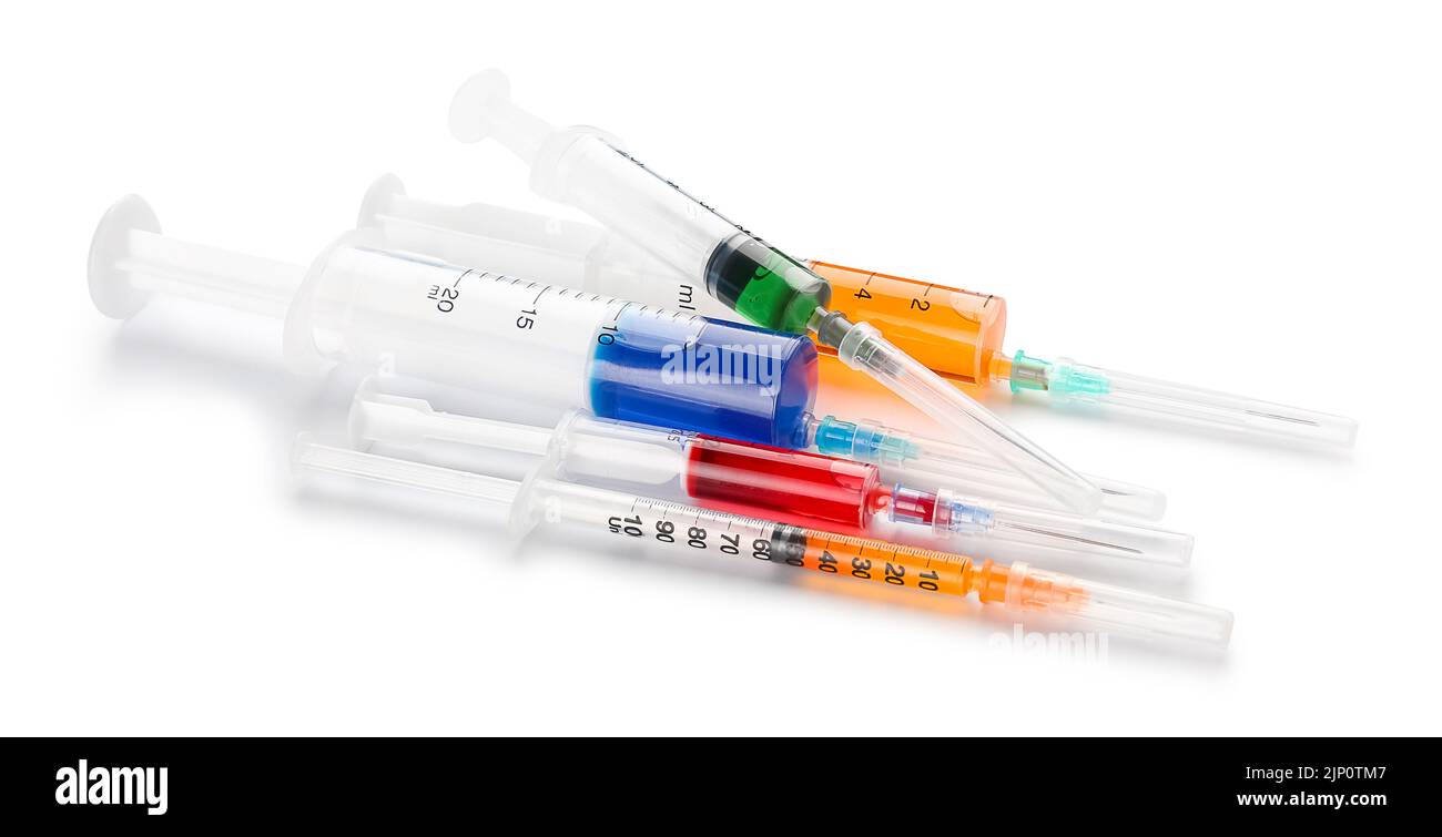 Different medical syringes with vaccine on white background Stock Photo ...
