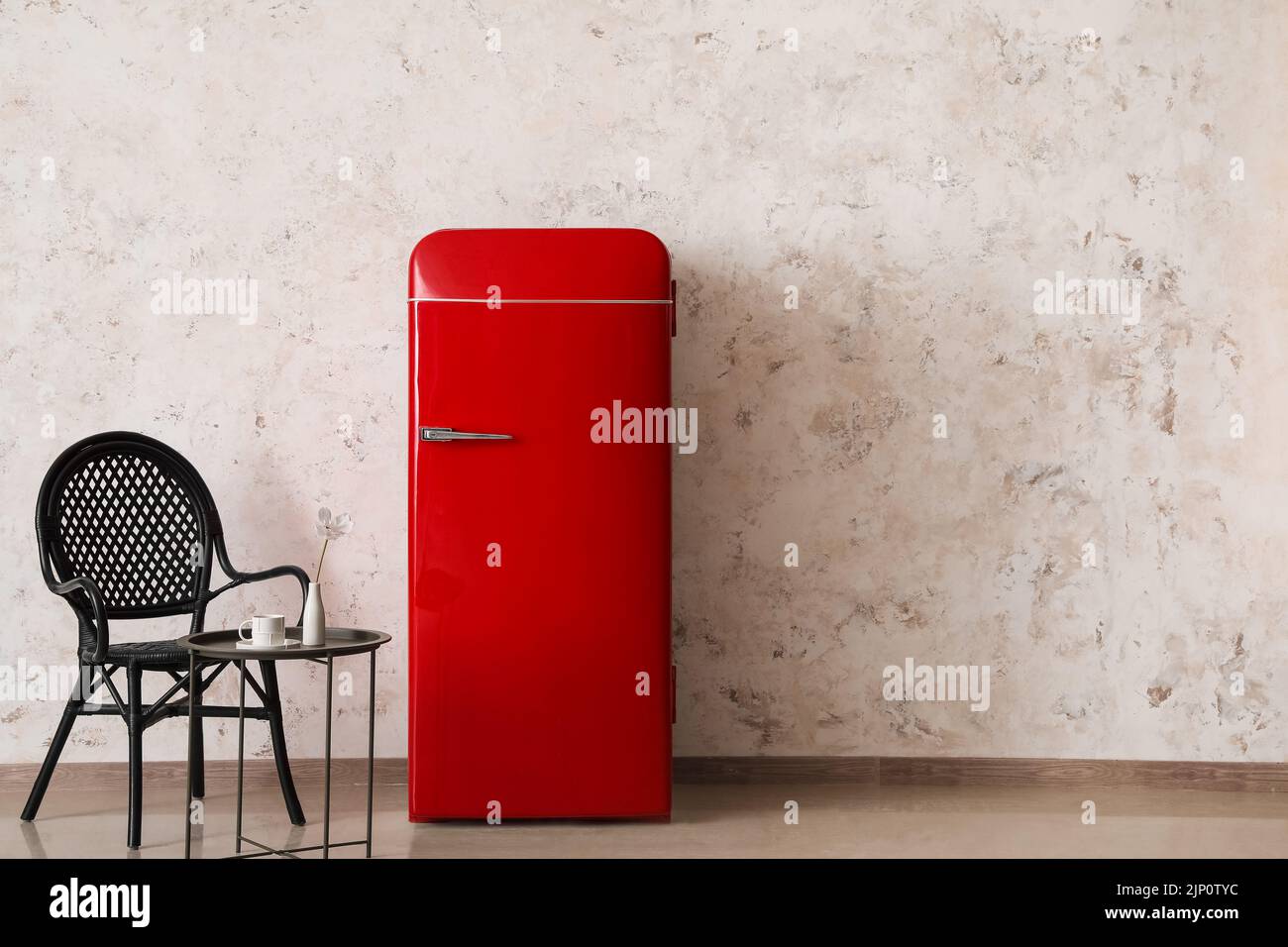 Interior of stylish room with red fridge, chair and table Stock Photo ...