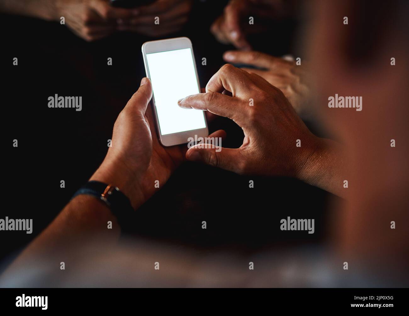 I cant stay too long guys. Closeup of an unrecognizable man texting on ...