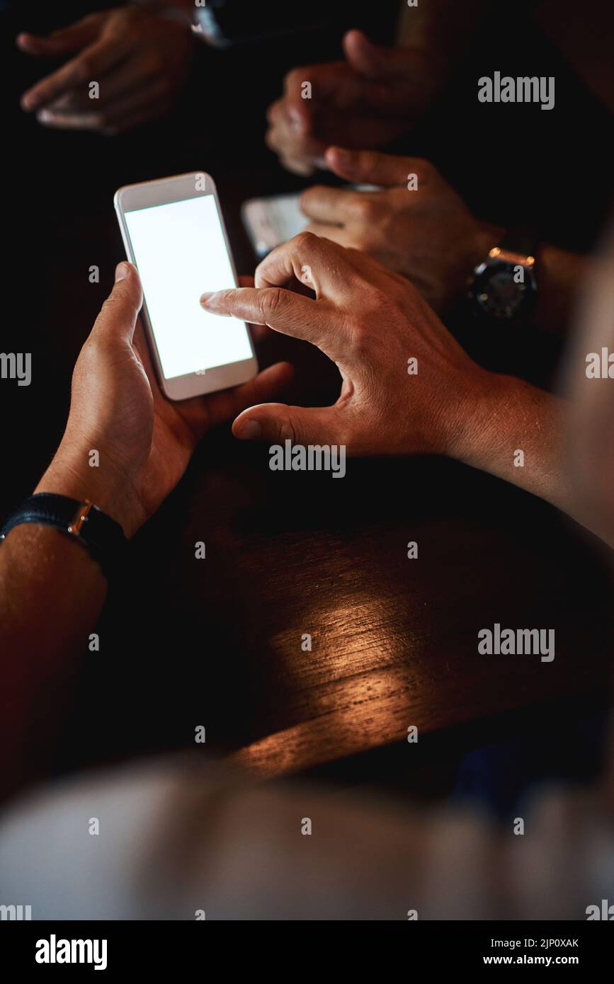 Lets invite more friends. Closeup of an unrecognizable man texting on ...