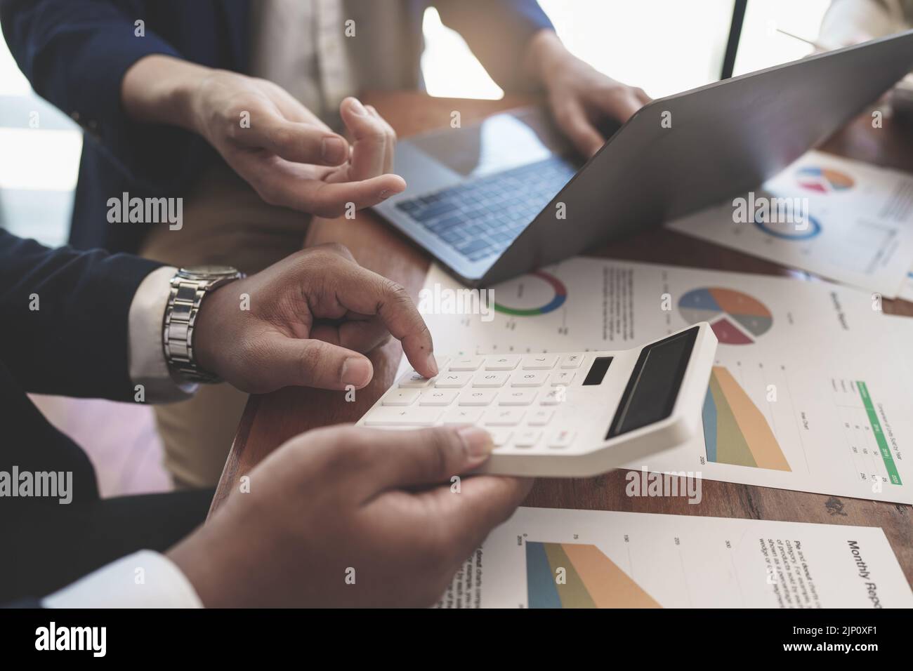 Account, audit and saving concept. Businessman do math and analyze with ...