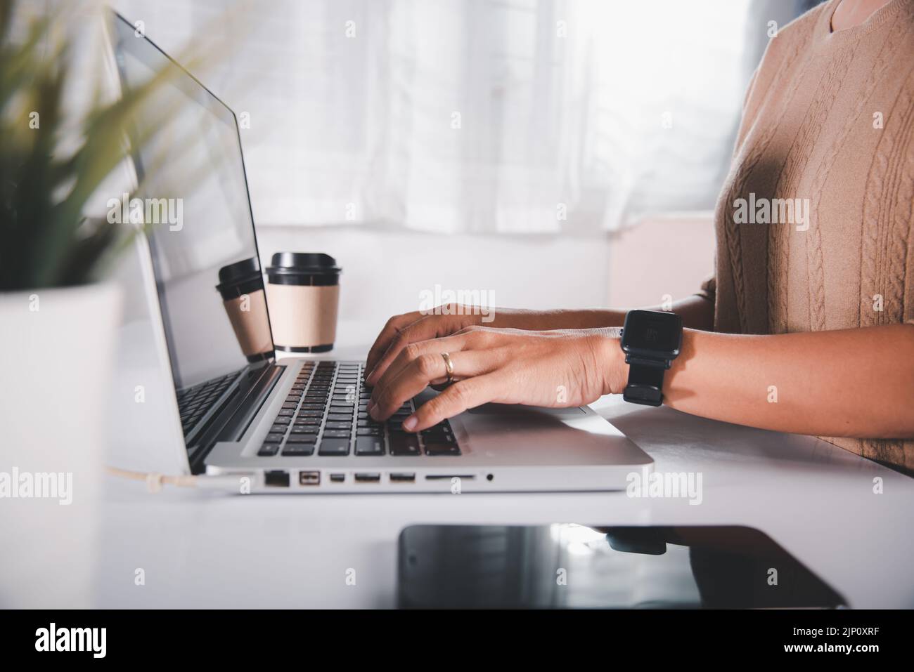 Typing keyboard. Female person text message for new project she remote ...
