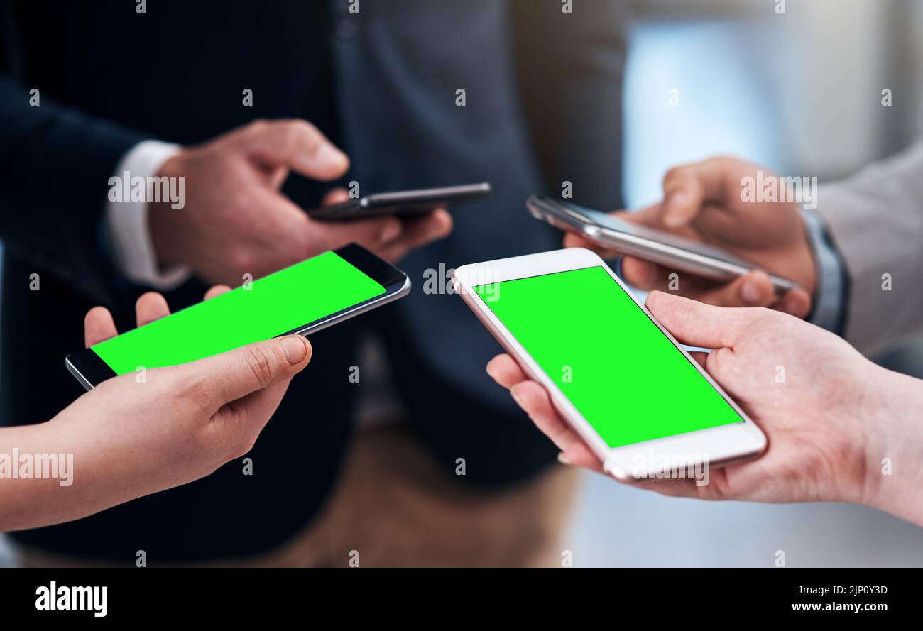 Business needs constant connection. a group of businesspeople using ...