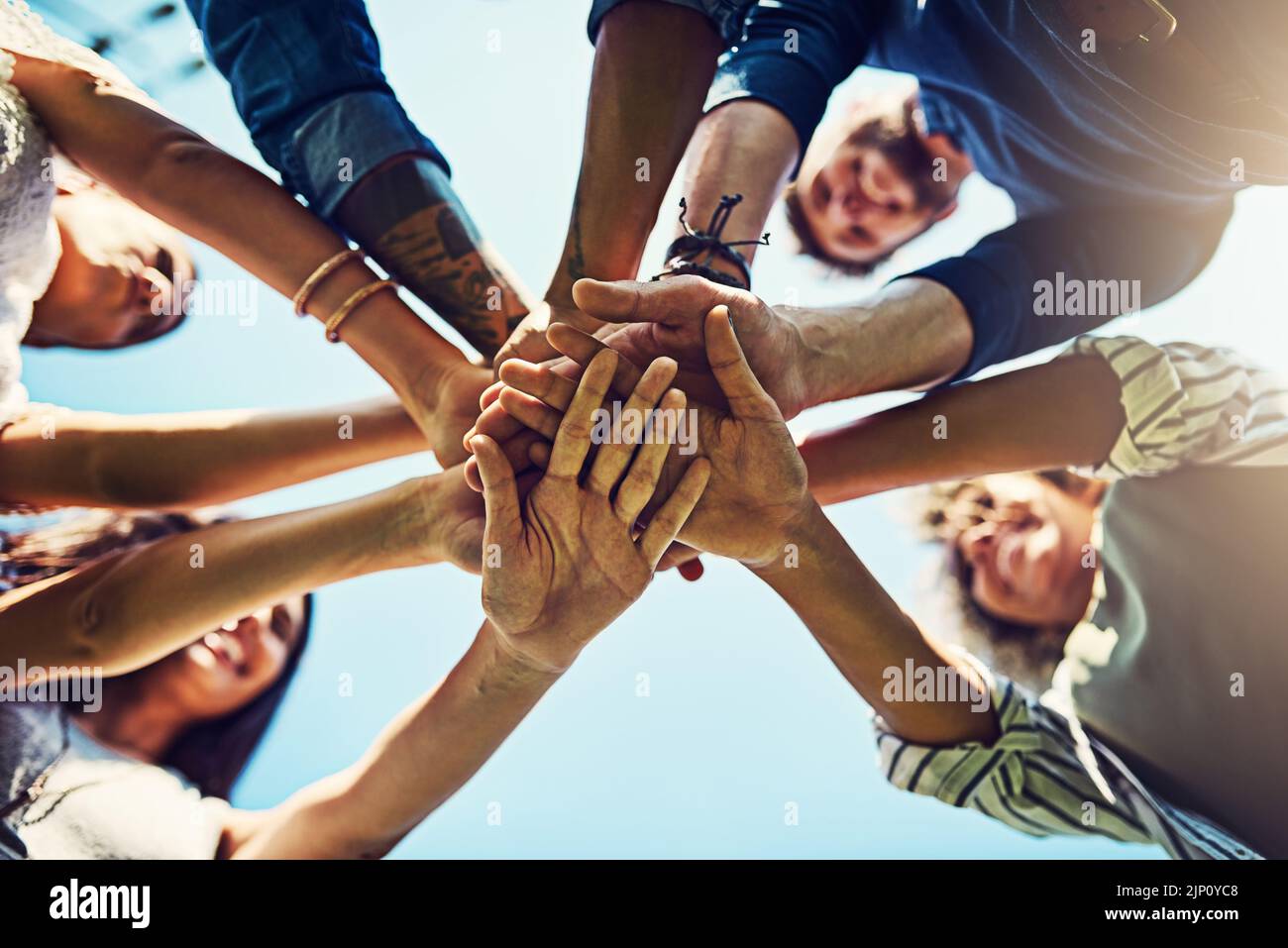 Sharing a solid friendship. Closeup shot of an unrecognizable group of ...