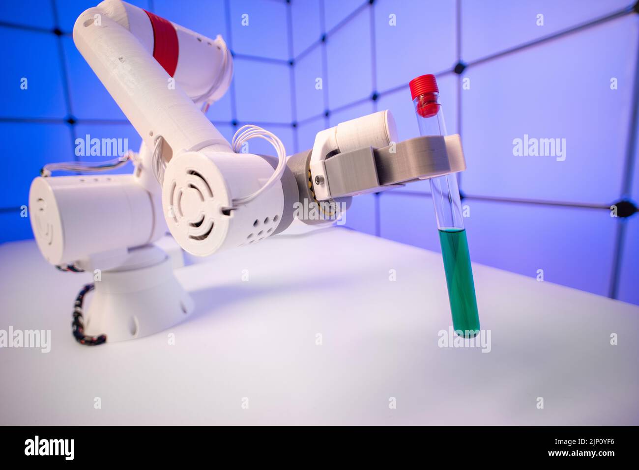 Robot take a test tube with a liquid. Laboratory of poisonous and ...