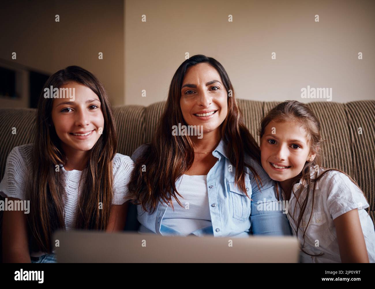 One happy family. Cropped portrait of an attractive mother watching ...